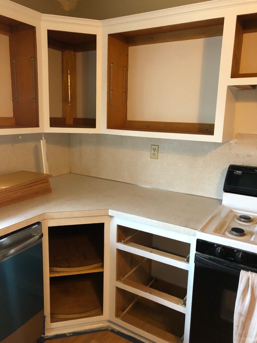 White Kitchen - DIY wood cabinets to a bright white kitchen transformation